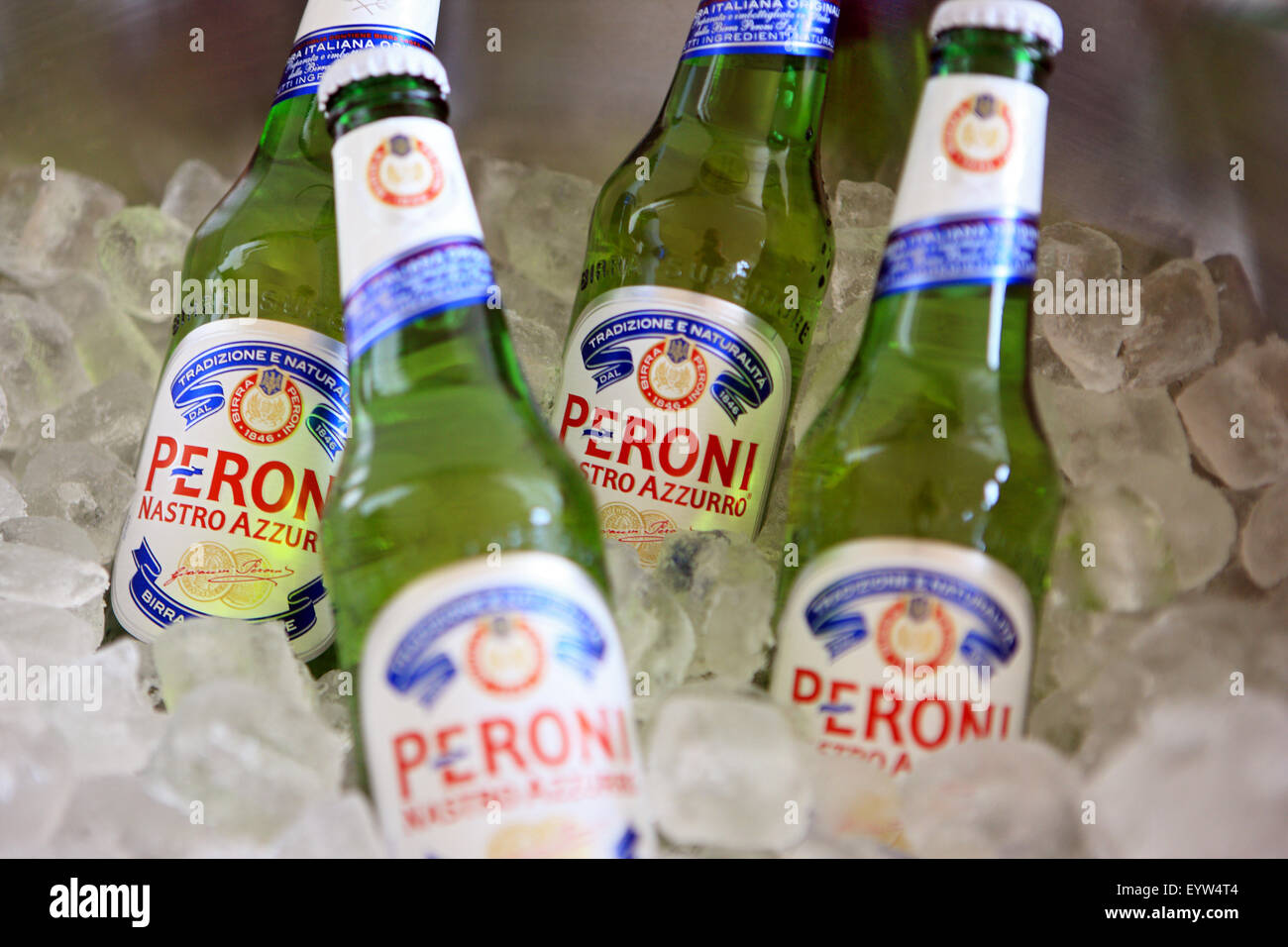 Bottles of Peroni lager cooling in an ice bucket Stock Photo - Alamy