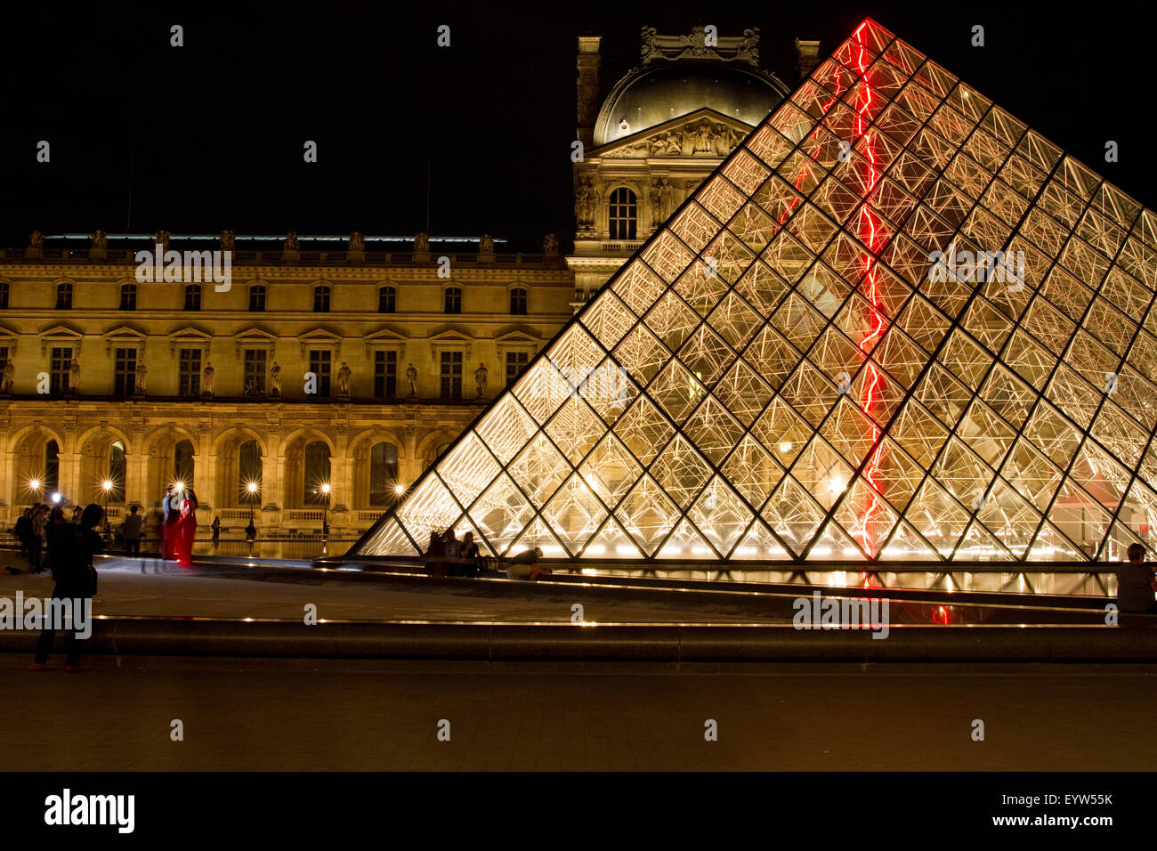 Louvre Pyramid (Pyramide du Louvre) at night with Pavillon Denon in the ...