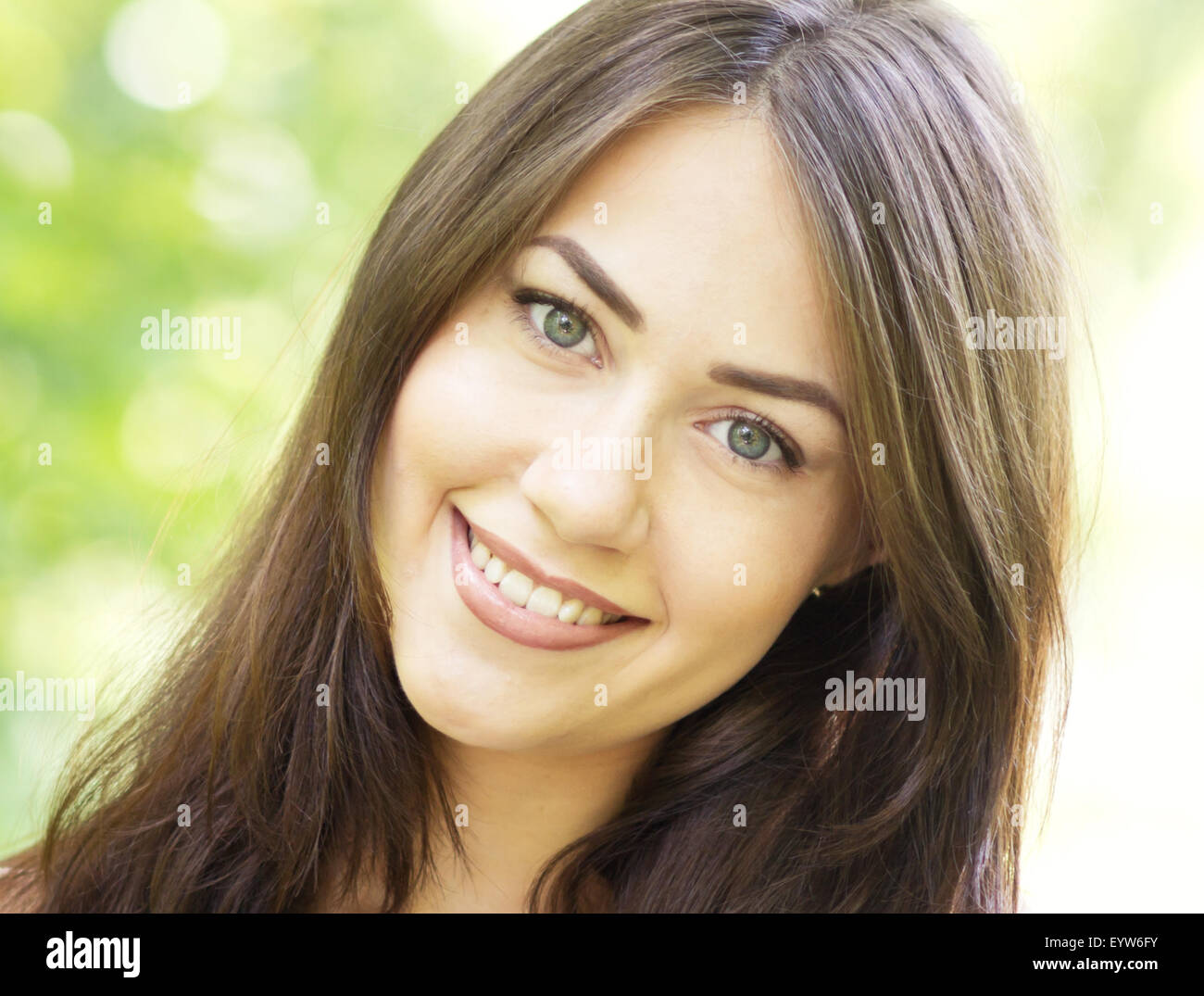 portrait of a young smiling beautiful woman Stock Photo - Alamy