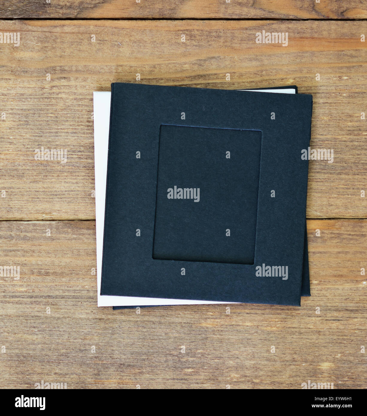stack of photo frames on wooden background Stock Photo - Alamy