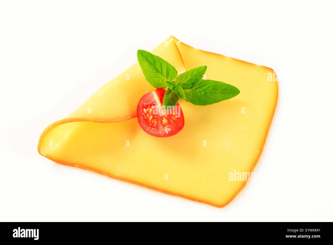 Thin slice of smoked yellow cheese Stock Photo - Alamy