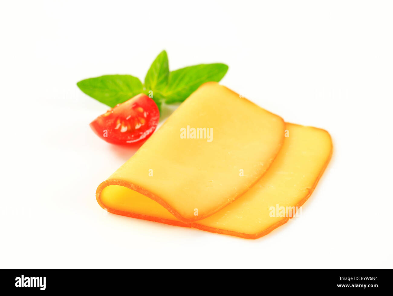 Thin slice of smoked yellow cheese Stock Photo - Alamy