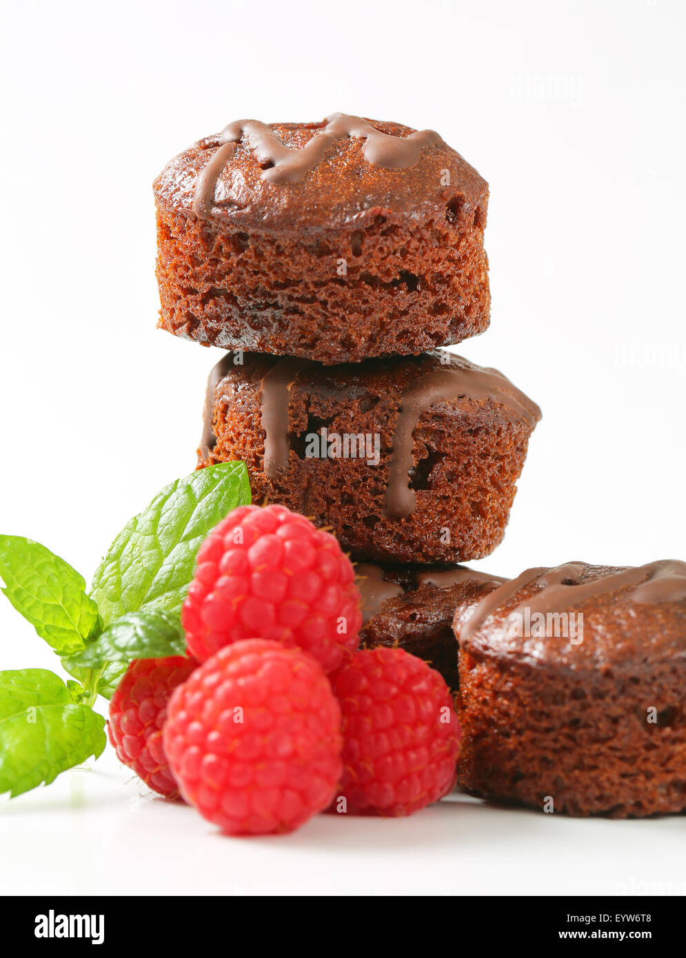 Mini chocolate cakes with raspberry filling Stock Photo - Alamy