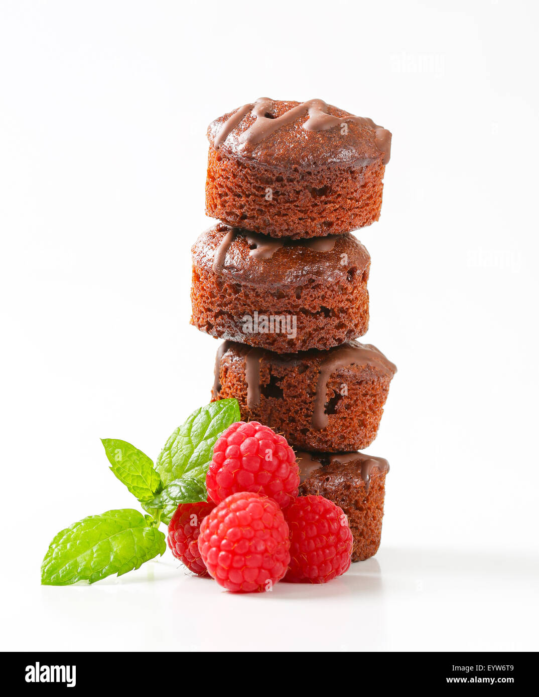 Mini chocolate cakes with raspberry filling Stock Photo - Alamy