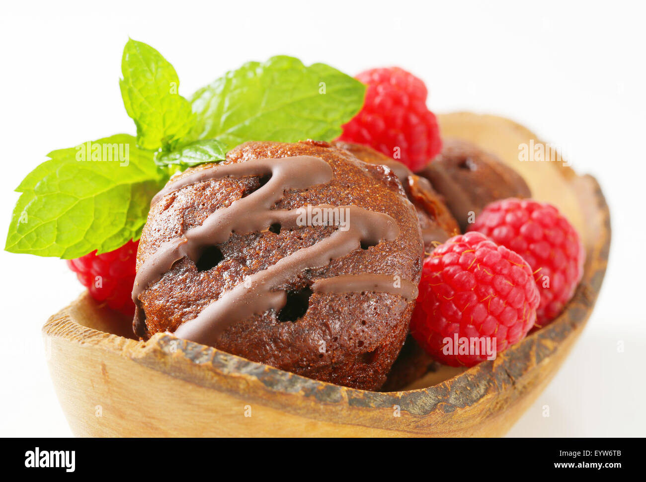 Mini chocolate cakes with raspberry filling Stock Photo - Alamy