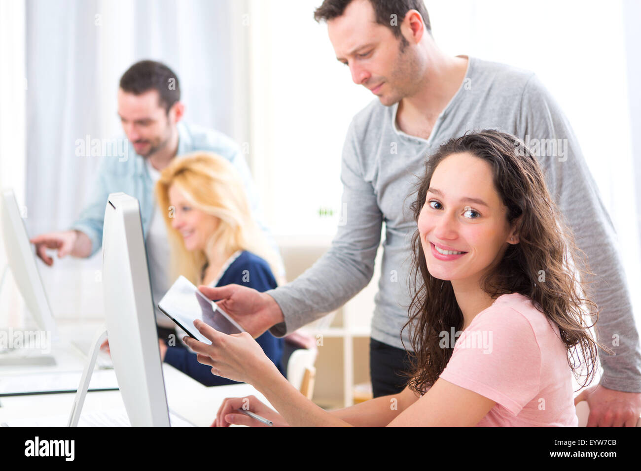 Attractive young teacher taking hi-res stock photography and images - Alamy