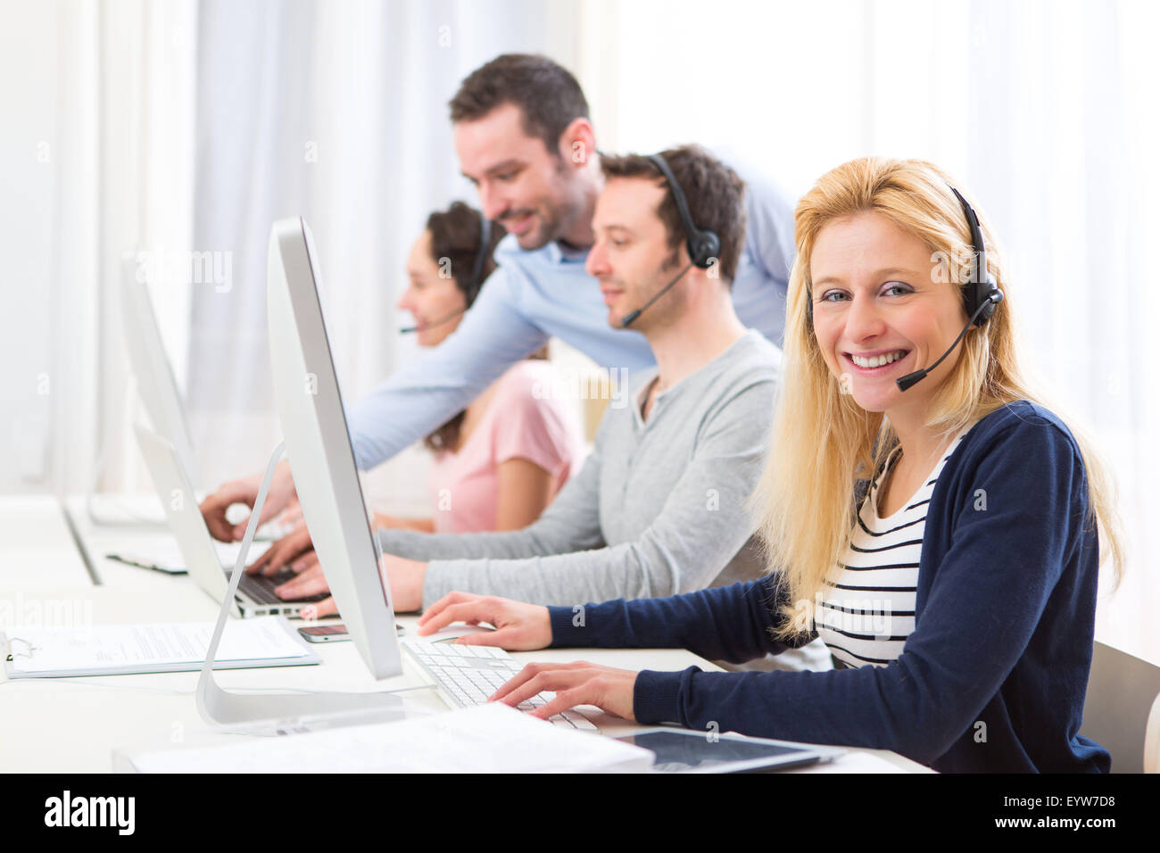Team call center woman hi-res stock photography and images - Alamy