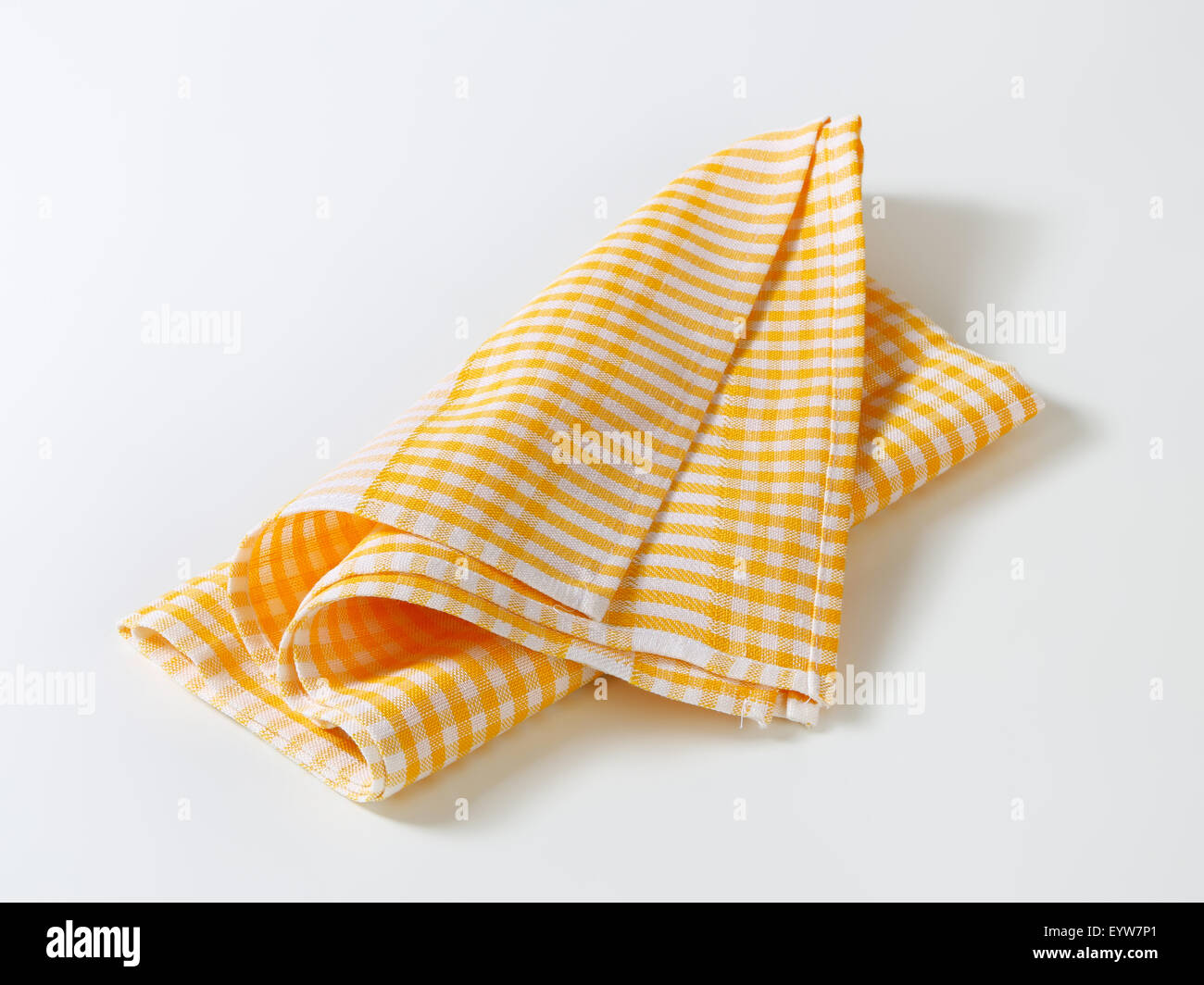 Checked yellow linen tea towel Stock Photo - Alamy