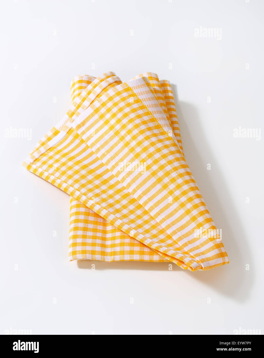 Checked yellow linen tea towel Stock Photo - Alamy