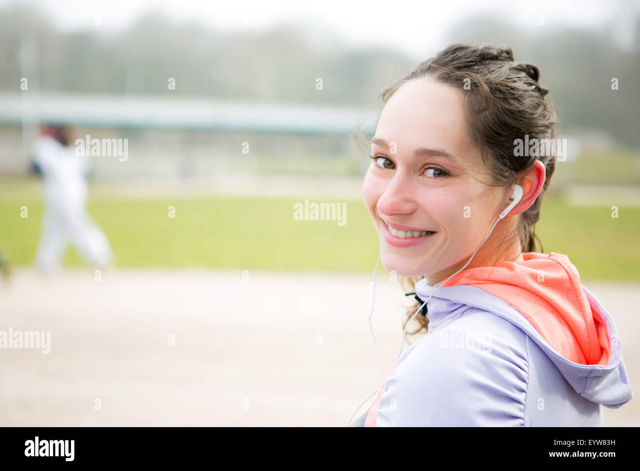 View of a young attractive woman after a running session Stock Photo ...