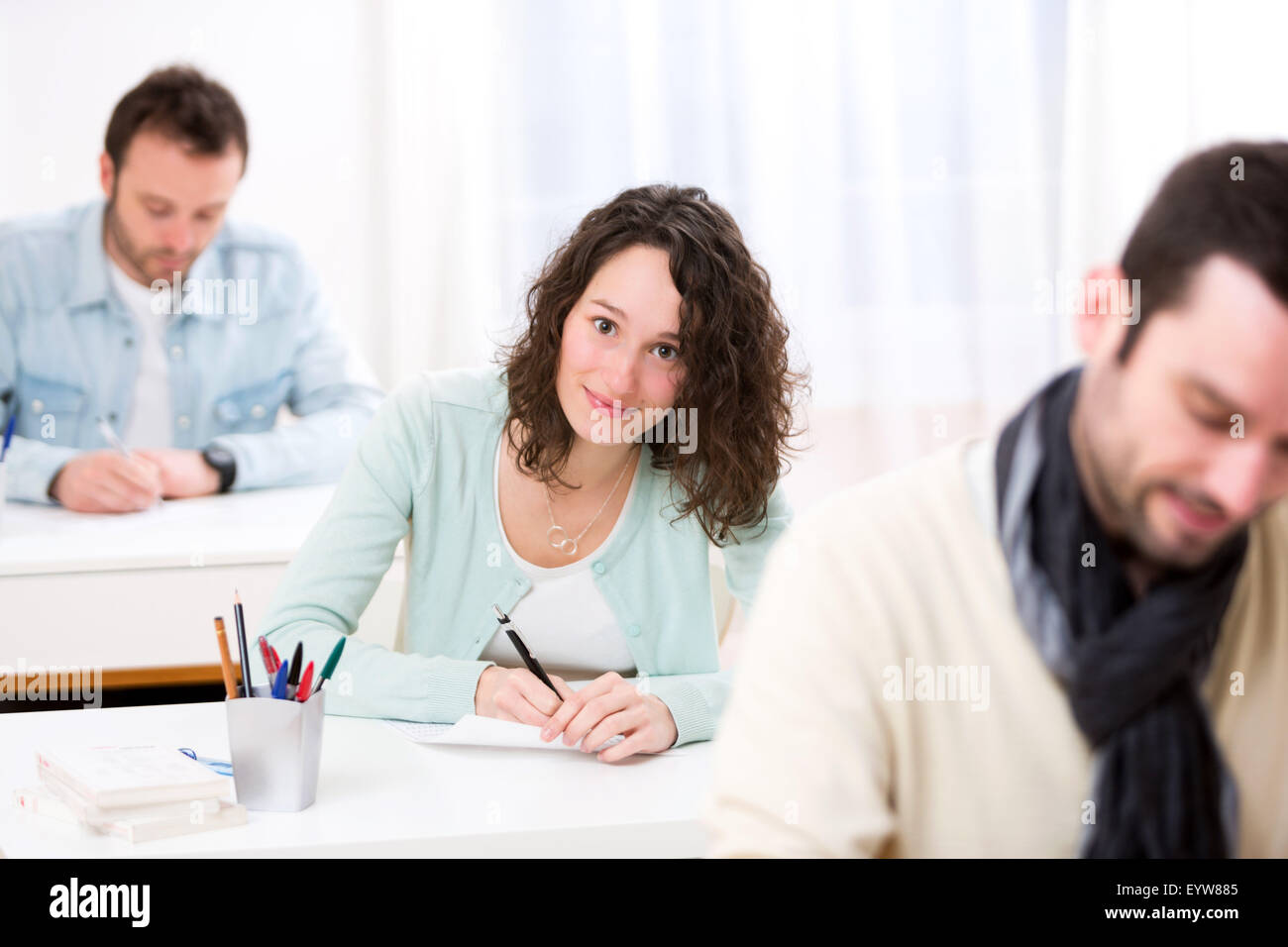 View of a Young attractive student taking exams Stock Photo - Alamy