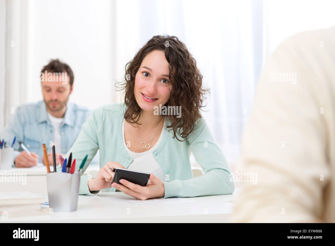 View of a Young attractive student taking mathematics exams Stock Photo ...