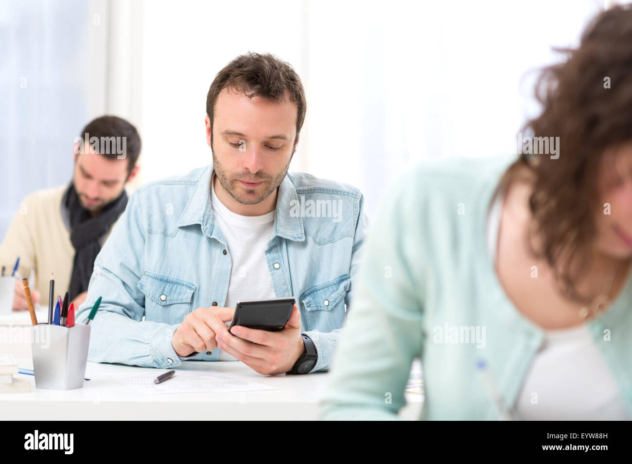View of a Young attractive student taking mathematics exams Stock Photo ...