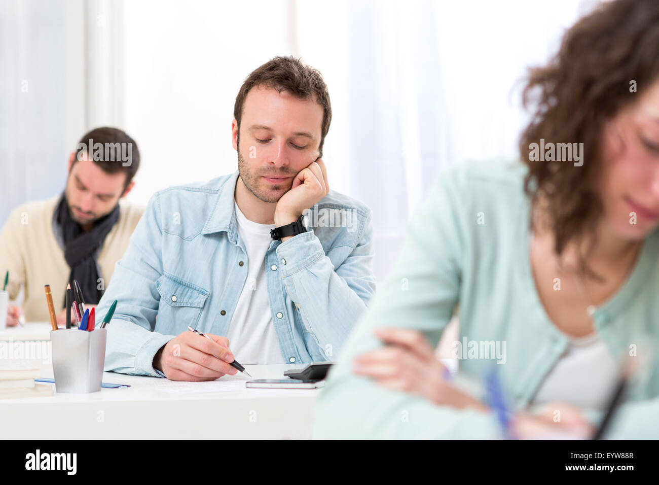 View of a Young attractive man taking exams Stock Photo - Alamy