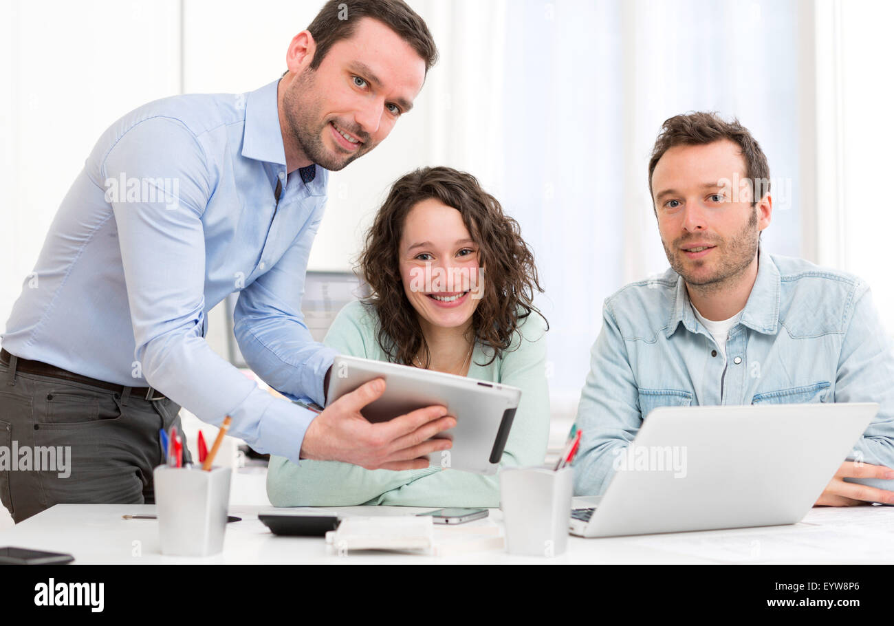 View of Two interns working together assisted by their course ...