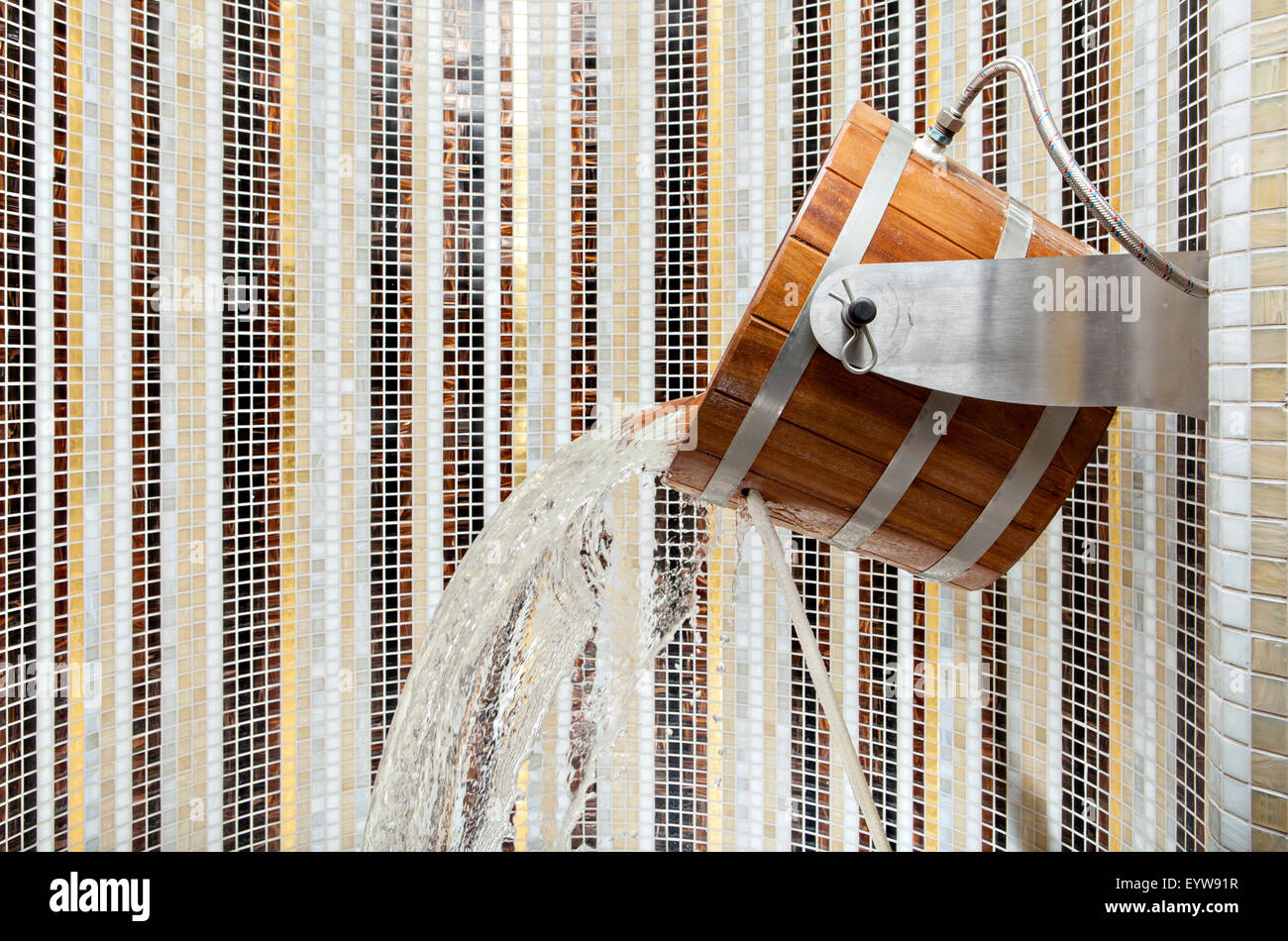 Wooden sauna bucket with spilling water in a Finnish sauna Stock Photo ...