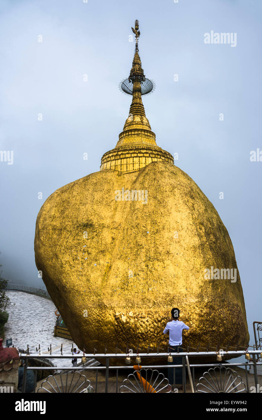 Praying believers, Golden Rock with Kyaiktiyo Pagoda, fog, Kyaikto ...