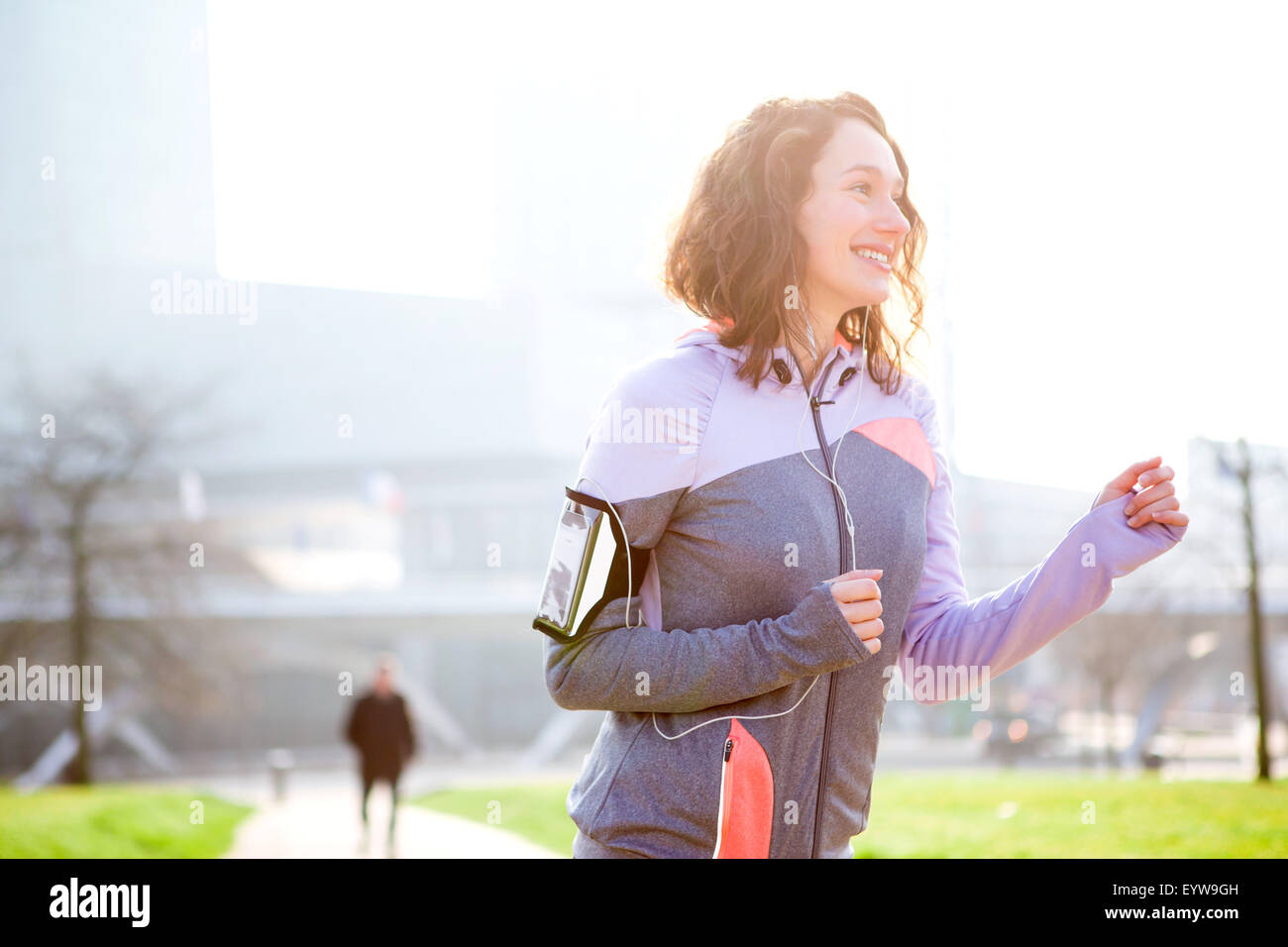 Attractive woman running down park hi-res stock photography and images ...