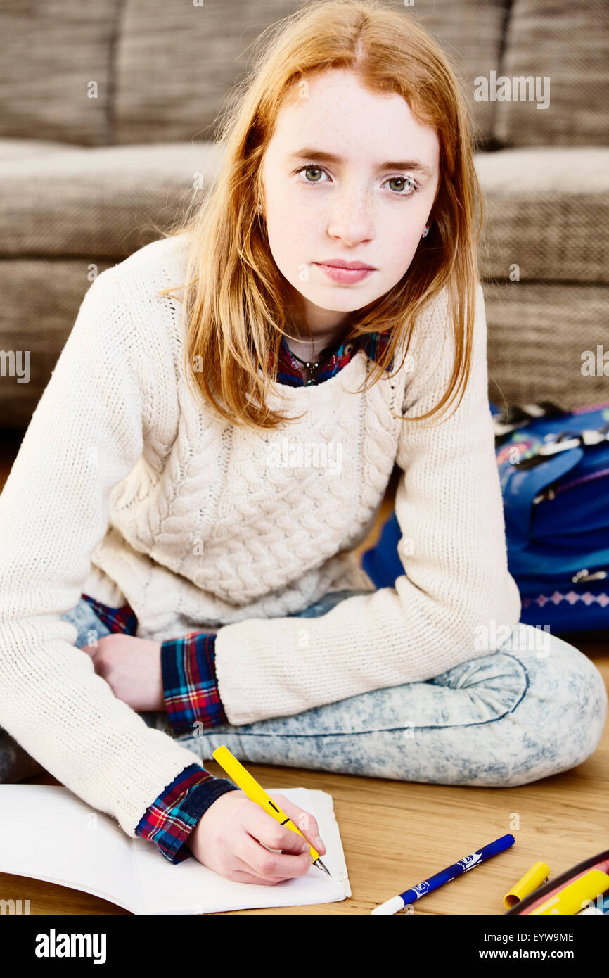 Hand doing homework hi-res stock photography and images - Alamy