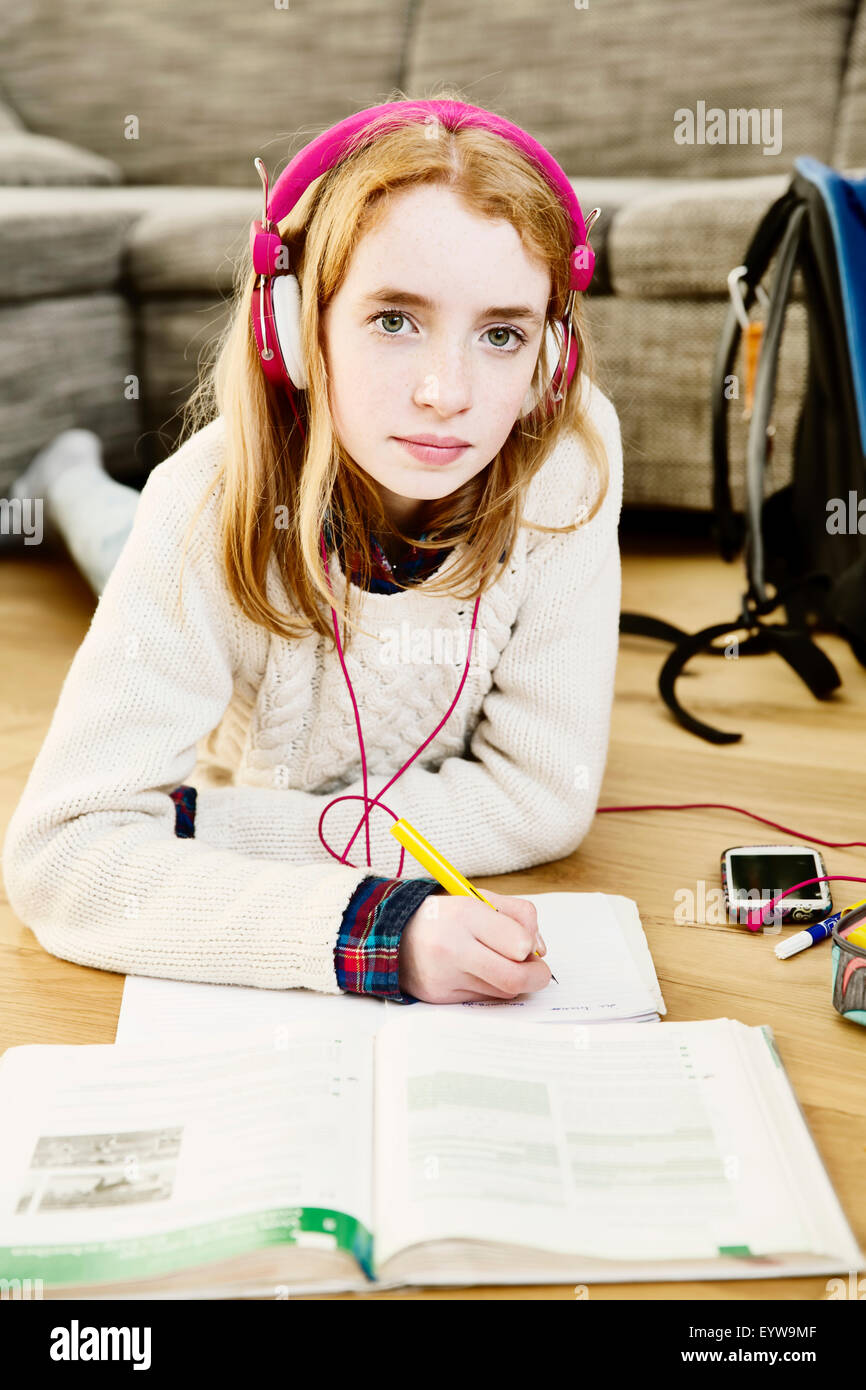 Hand doing homework hi-res stock photography and images - Alamy