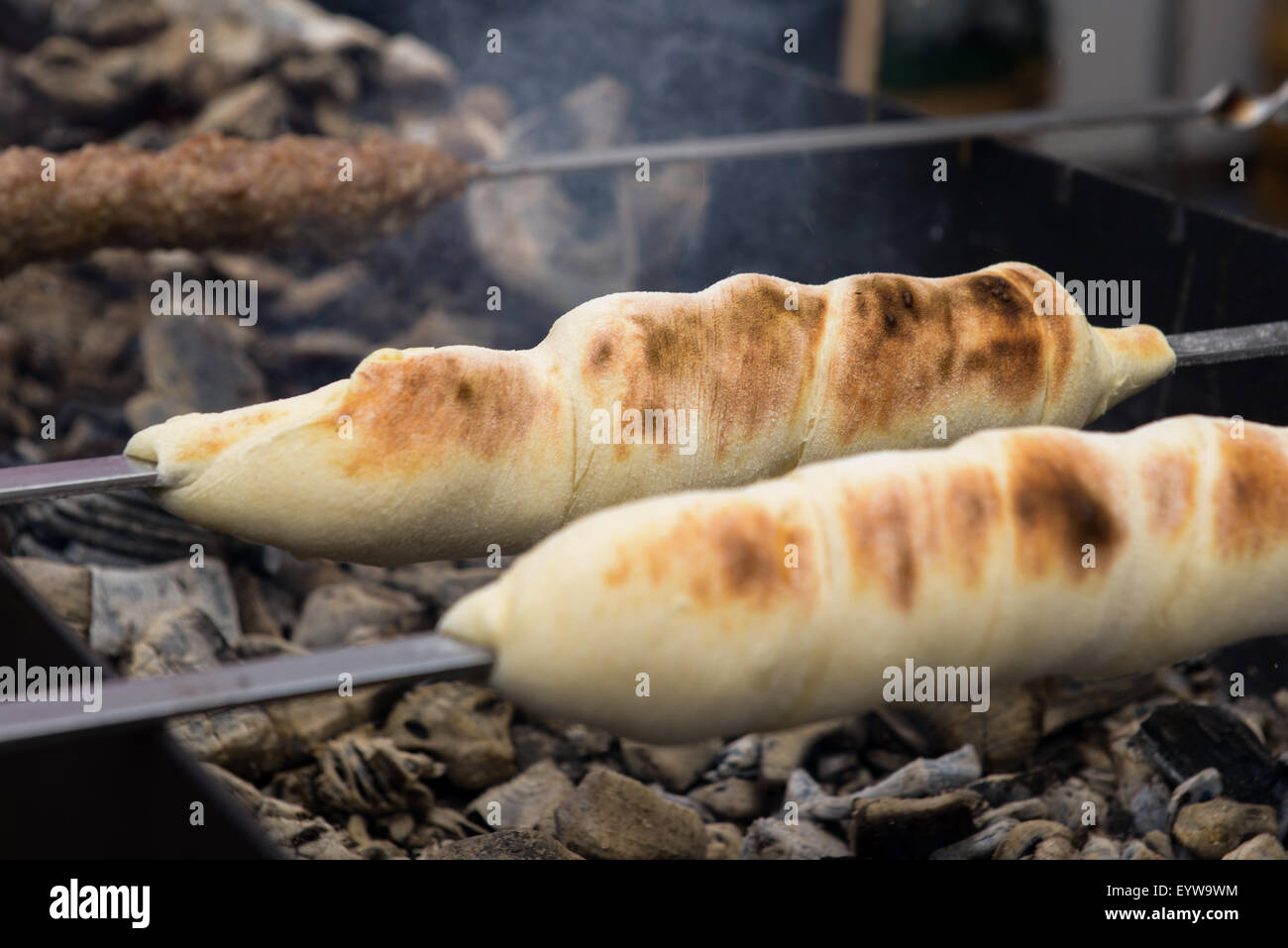 cooking meat on the hot steaming coals Stock Photo - Alamy