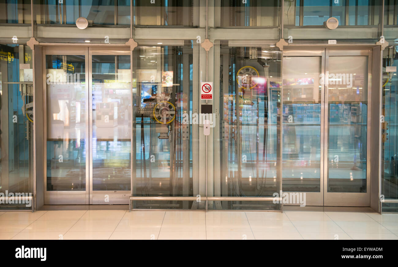 transparent airport elevator with no people inside Stock Photo - Alamy