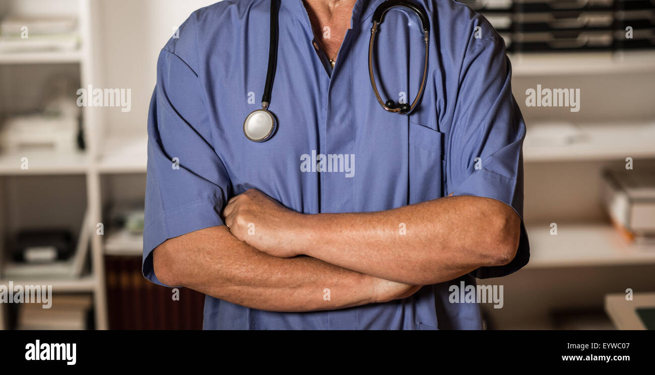 Doctor posing in his office Stock Photo - Alamy