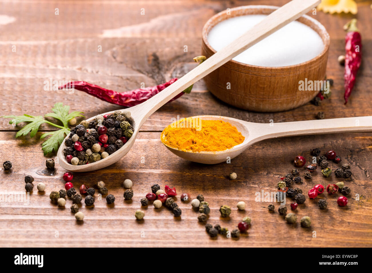 Various spices for cooking oh the wood table Stock Photo - Alamy