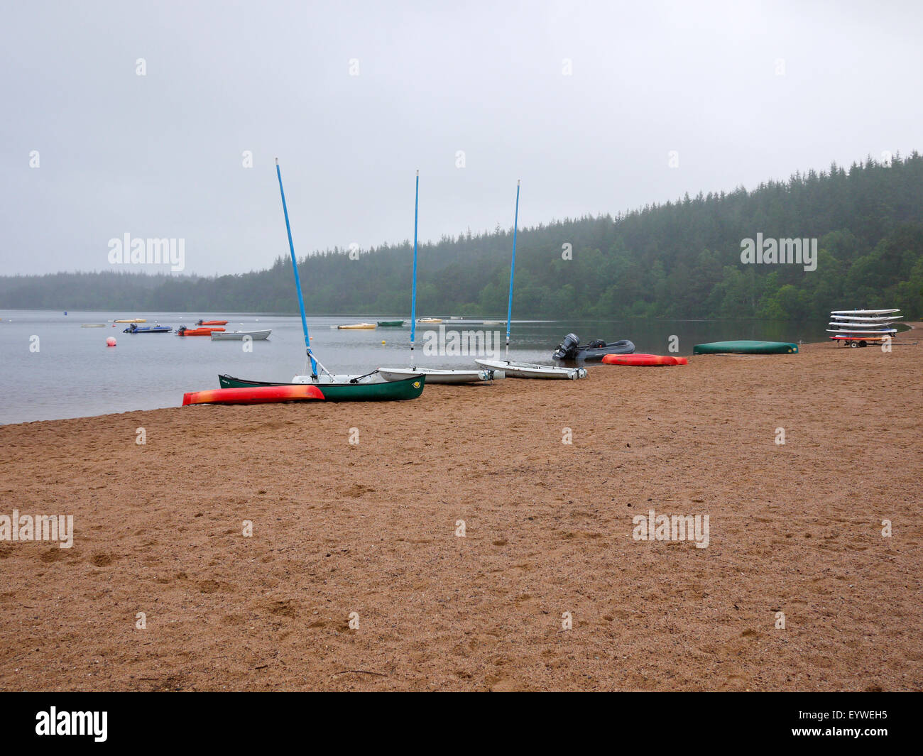 An empty Loch Morlic beach in wet misty conditions, Loch Morlic ...