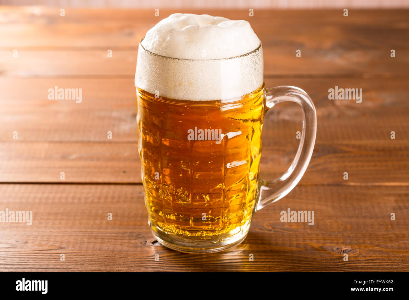 Beer mug on rustic wooden table Stock Photo - Alamy