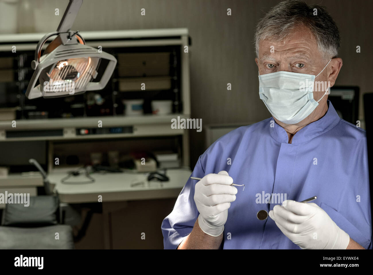 Dentist doing dental examination Stock Photo - Alamy