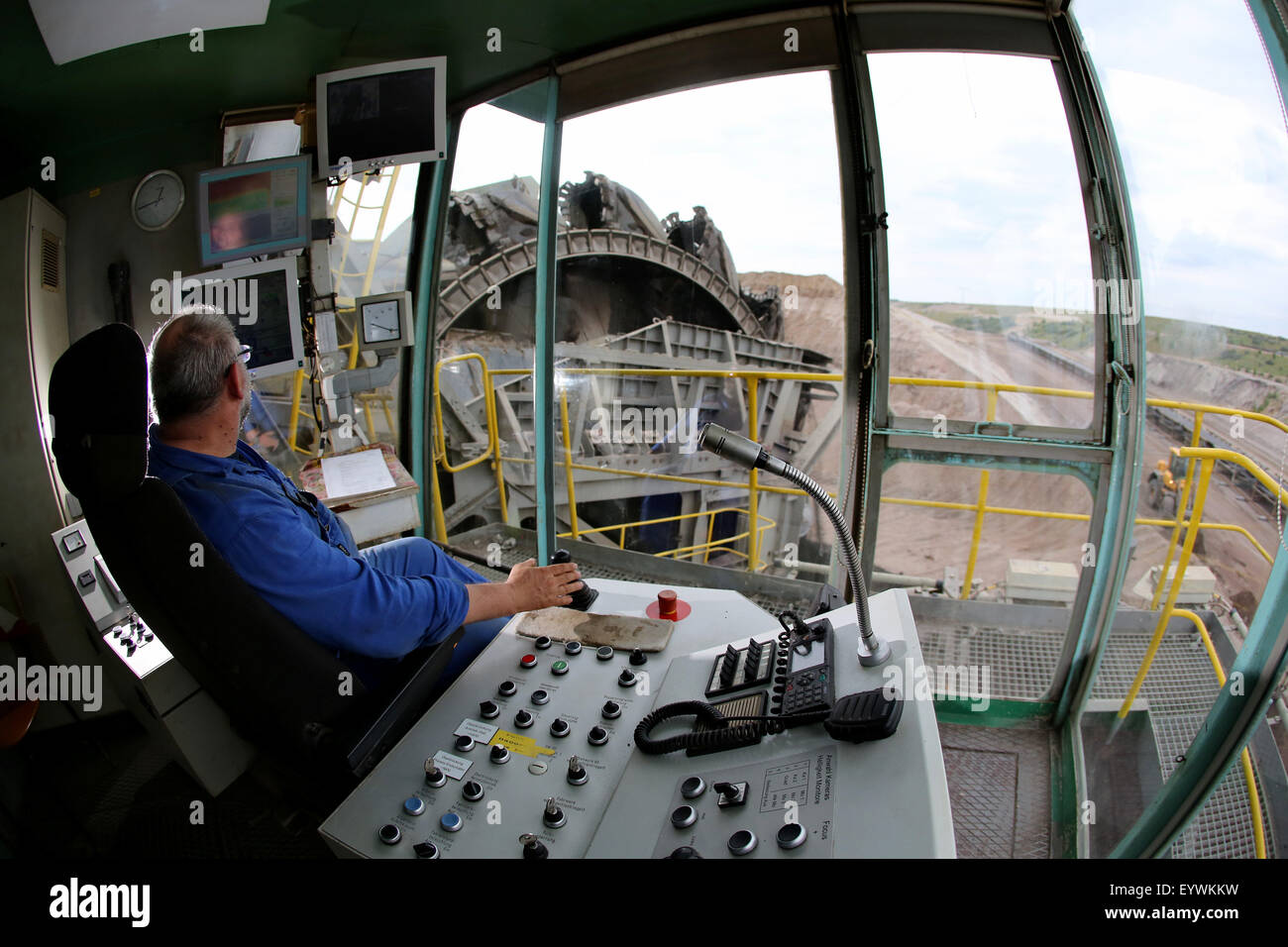 Poedelwitz, Germany. 11th June, 2015. Excavator operator Joerg ...