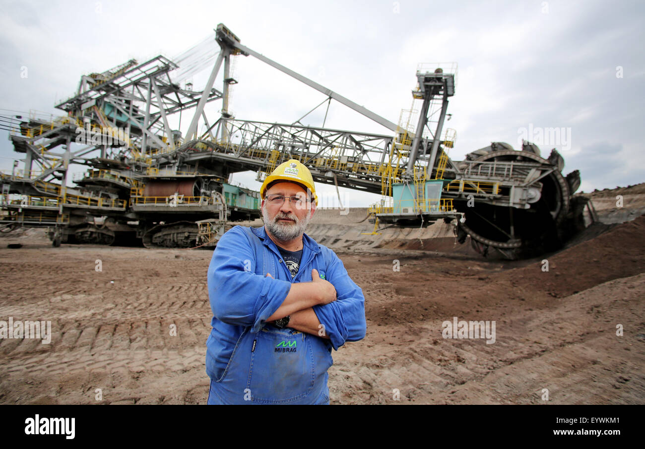 Poedelwitz, Germany. 11th June, 2015. Excavator operator Joerg ...