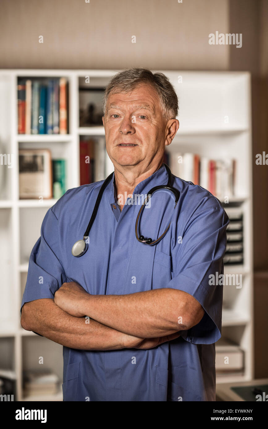Doctor posing in his office Stock Photo - Alamy