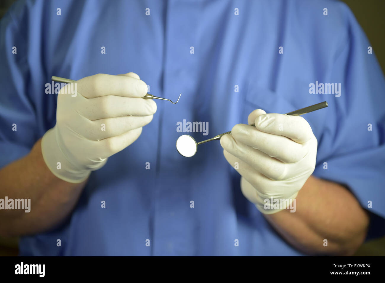 Dentist doing dental examination Stock Photo - Alamy