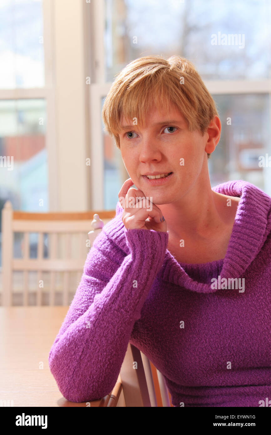 Portrait of a young woman with visual impairment and right sided ...