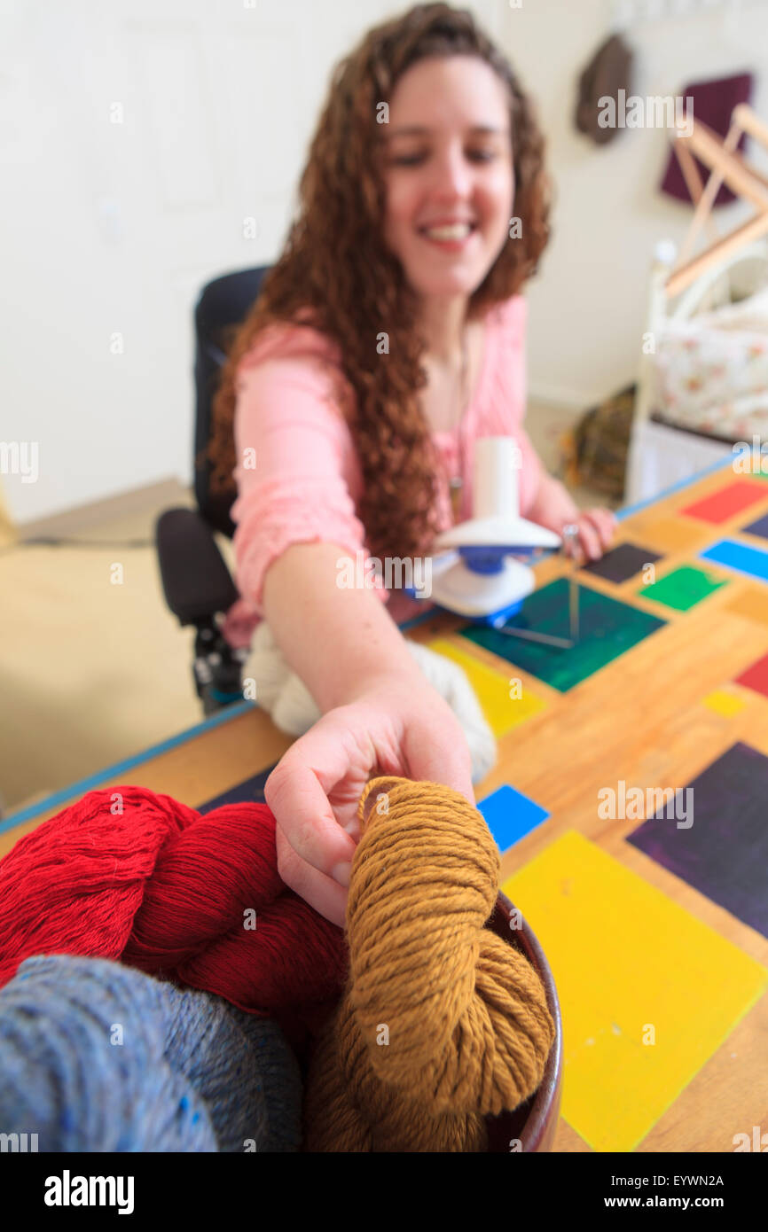 Woman with Muscular Dystrophy working with her knitting Stock Photo - Alamy