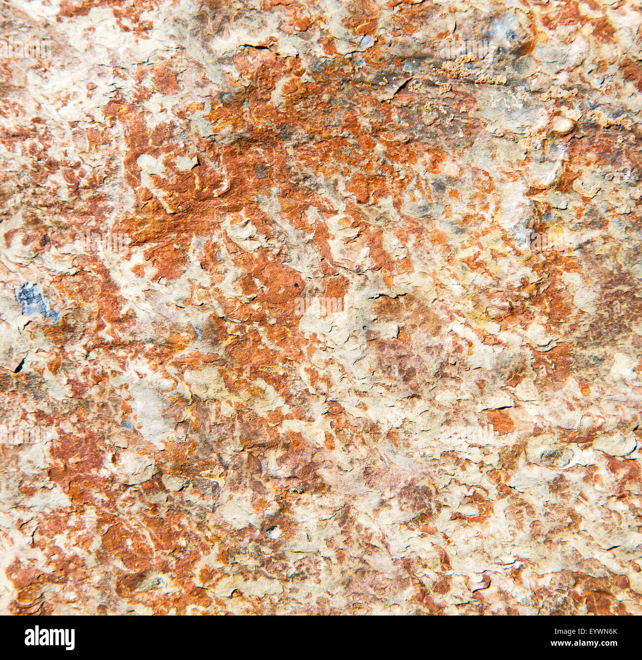 rocks stone and red orange gneiss in the wall of morocco Stock Photo ...
