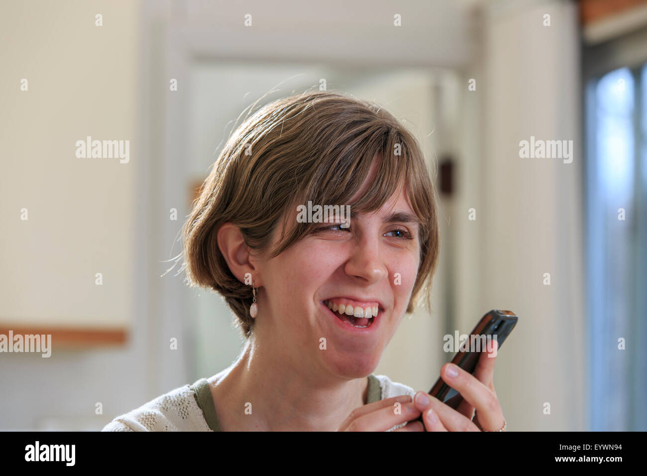 Blind woman using her cell phone Stock Photo - Alamy