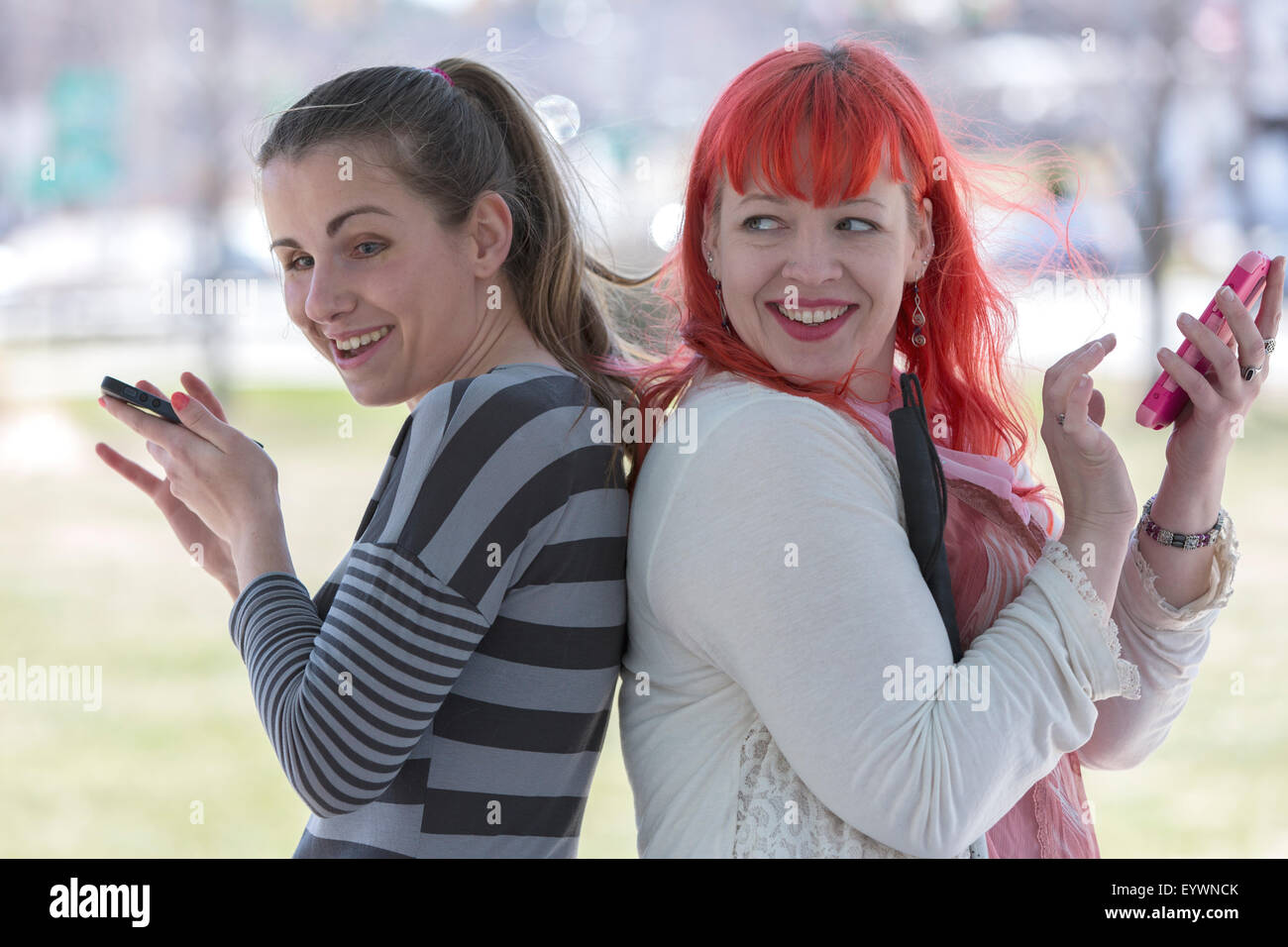 Blind young women using assistive technology on their cell phones Stock ...