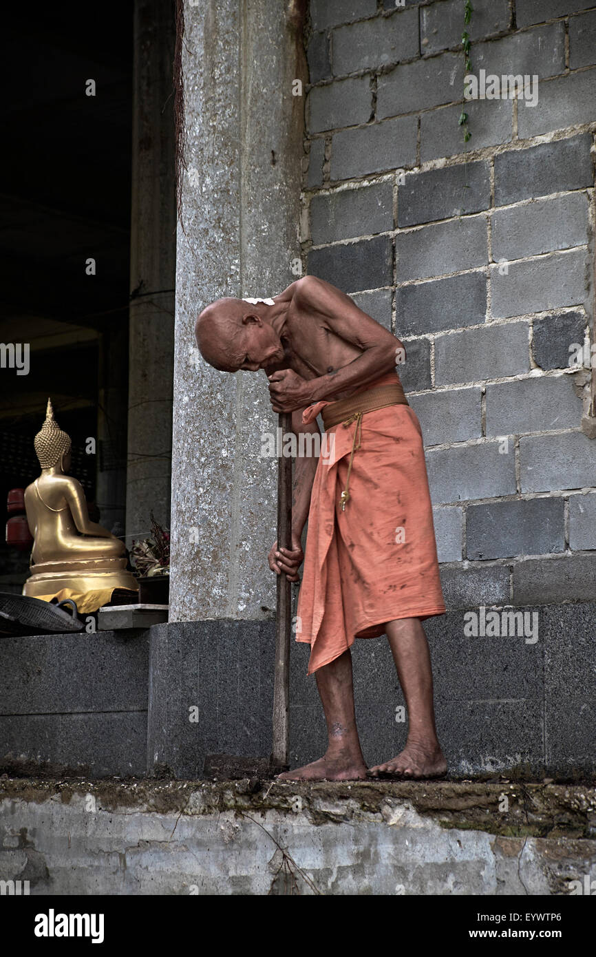 Elderly Thai monk at work in the temple. Thailand S. E. Asia Stock ...
