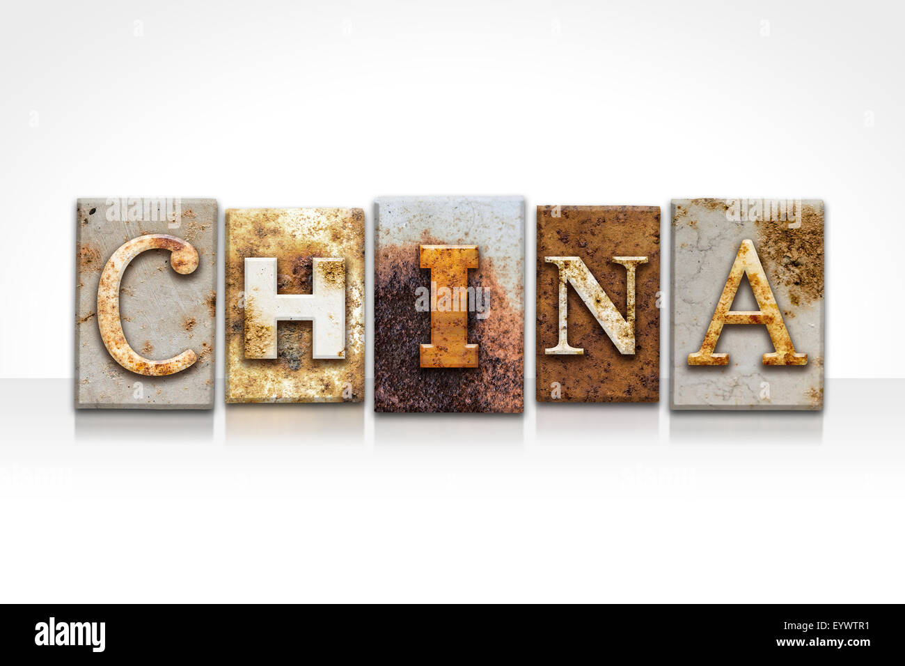 The word "CHINA" written in rusty metal letterpress type isolated on a ...