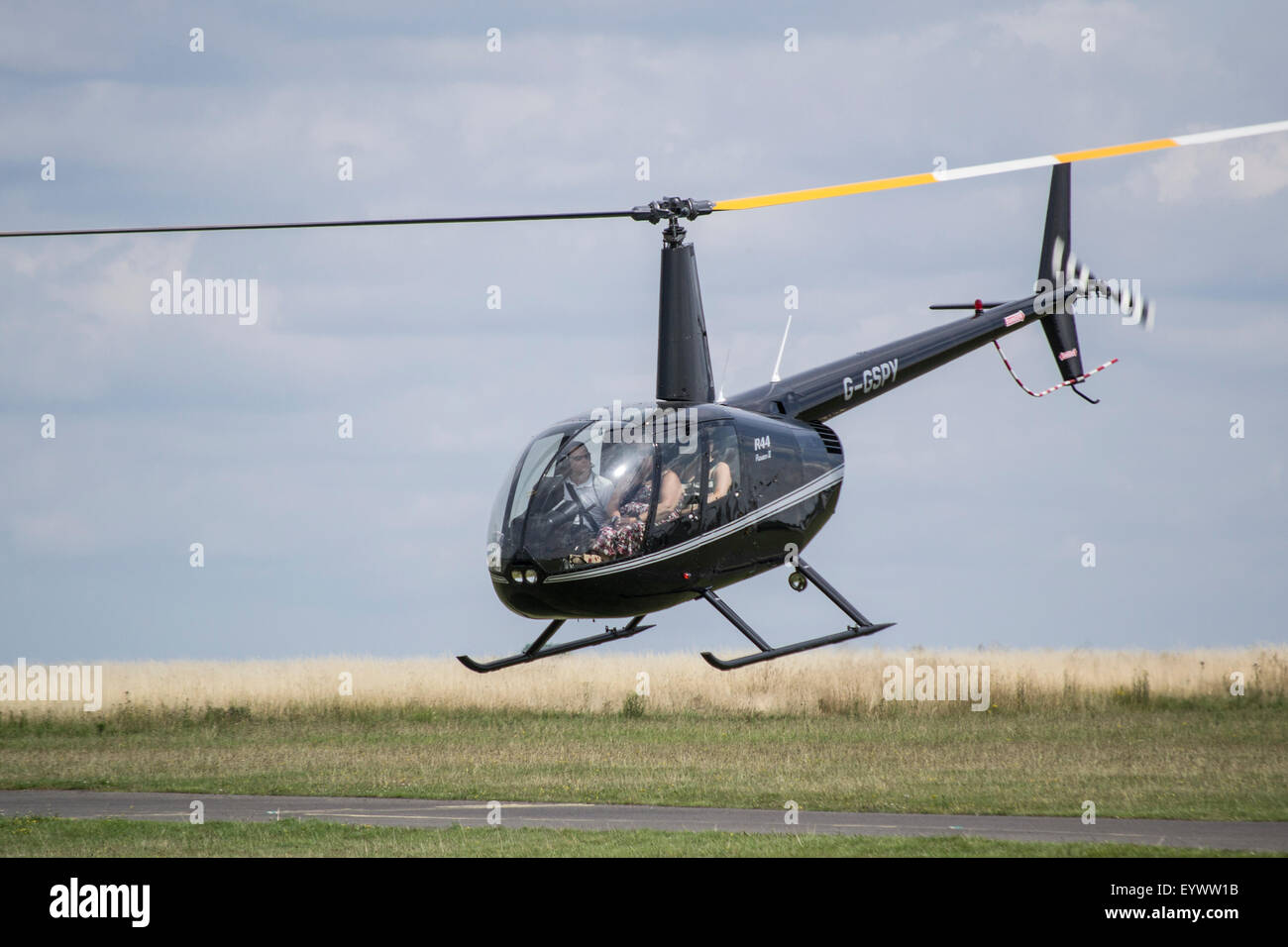 Robinson Raven R-44 helicopter G-GSPY Stock Photo - Alamy