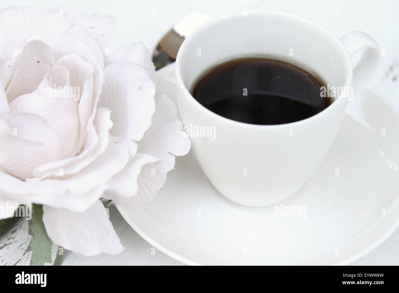 Breakfast romantic table with cup of coffee and a flower Stock Photo ...