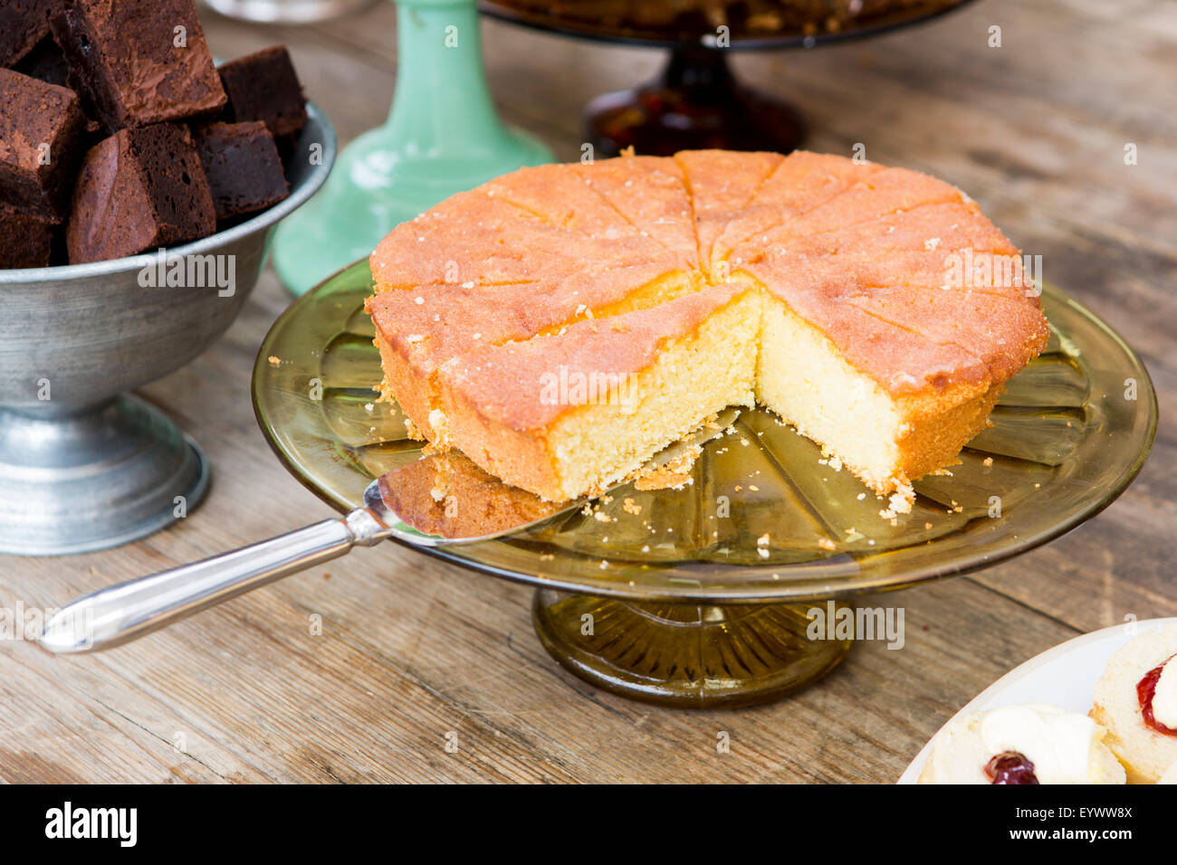 Lemon cake sliced, on vintage cake stand Stock Photo - Alamy