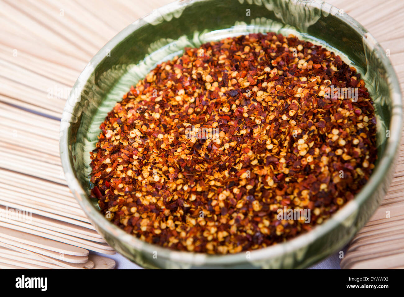 Dried chilli seeds in vintage bowl Stock Photo - Alamy