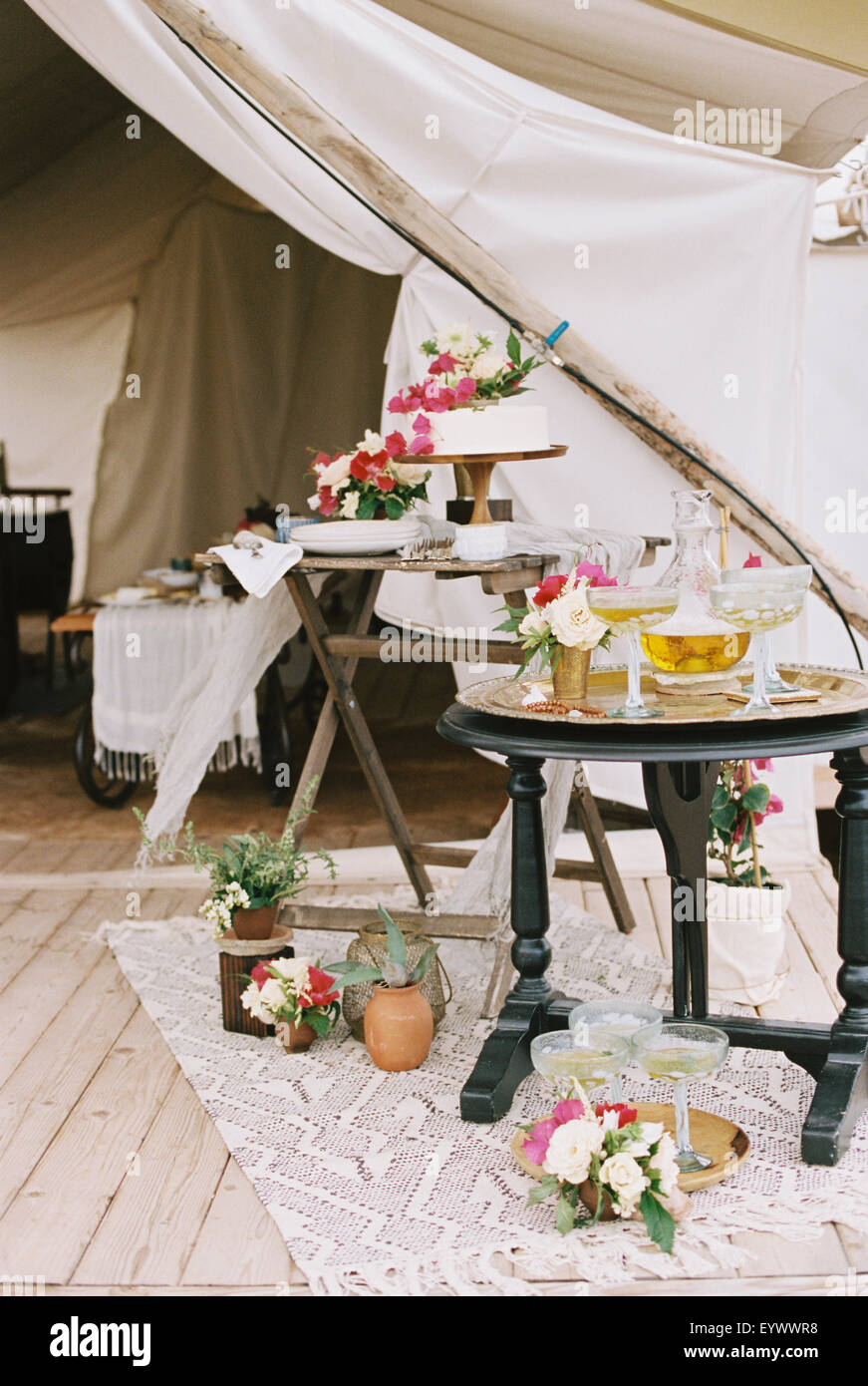 Food and drink on tables outside tent in a desert Stock Photo - Alamy