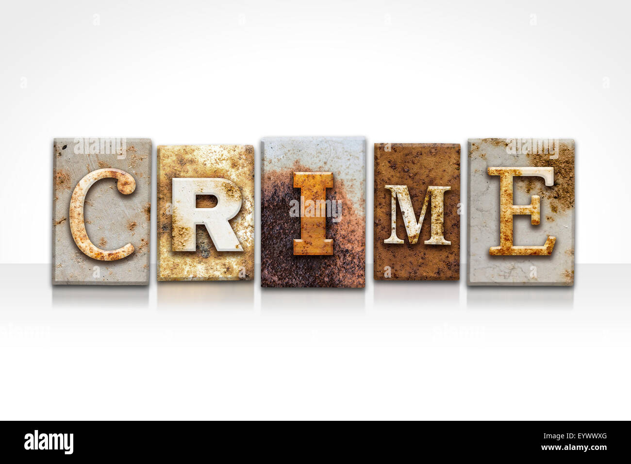 The word "CRIME" written in rusty metal letterpress type isolated on a ...
