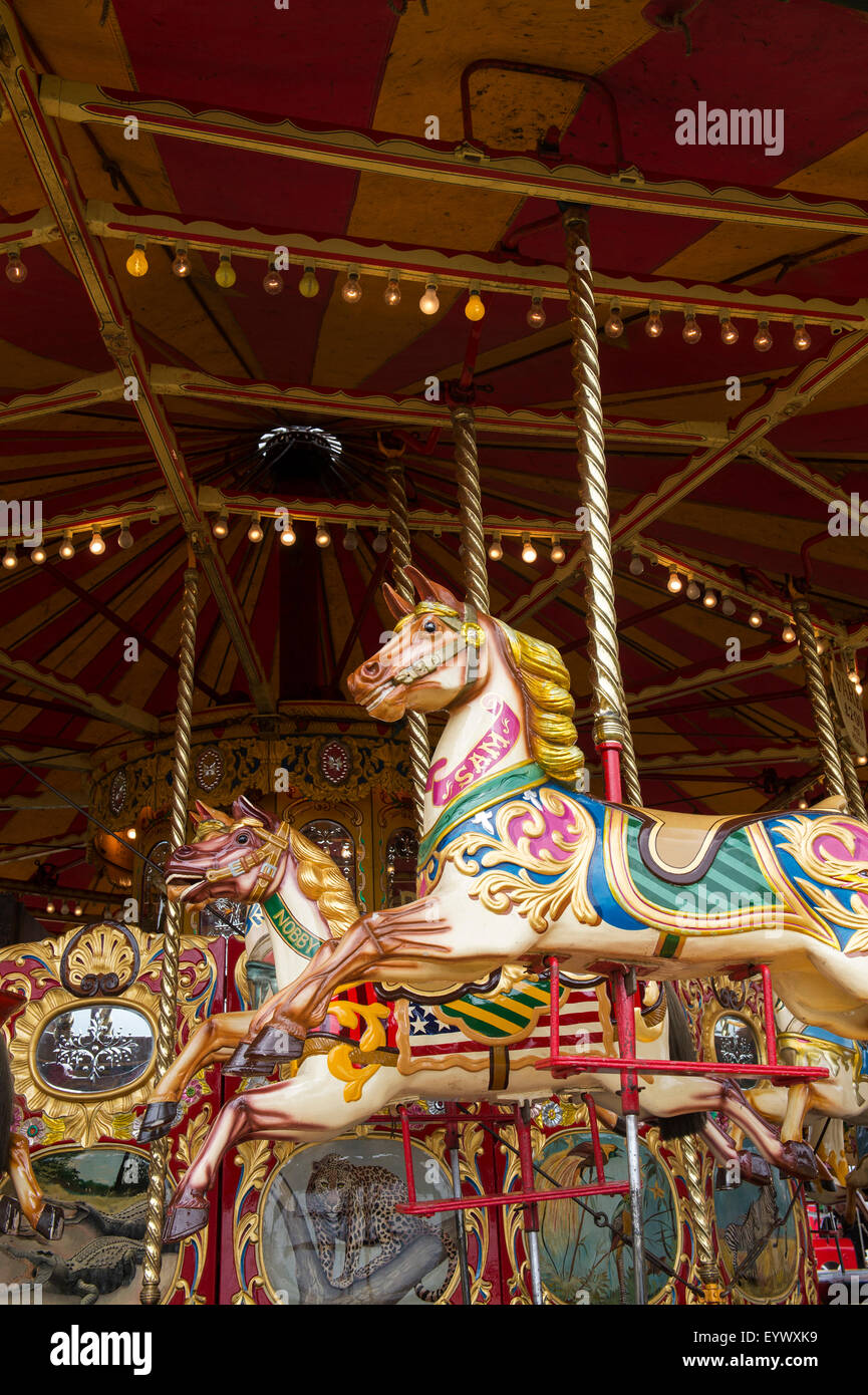 Steam Galloping horse carousel, fairground ride at a steam fair ...