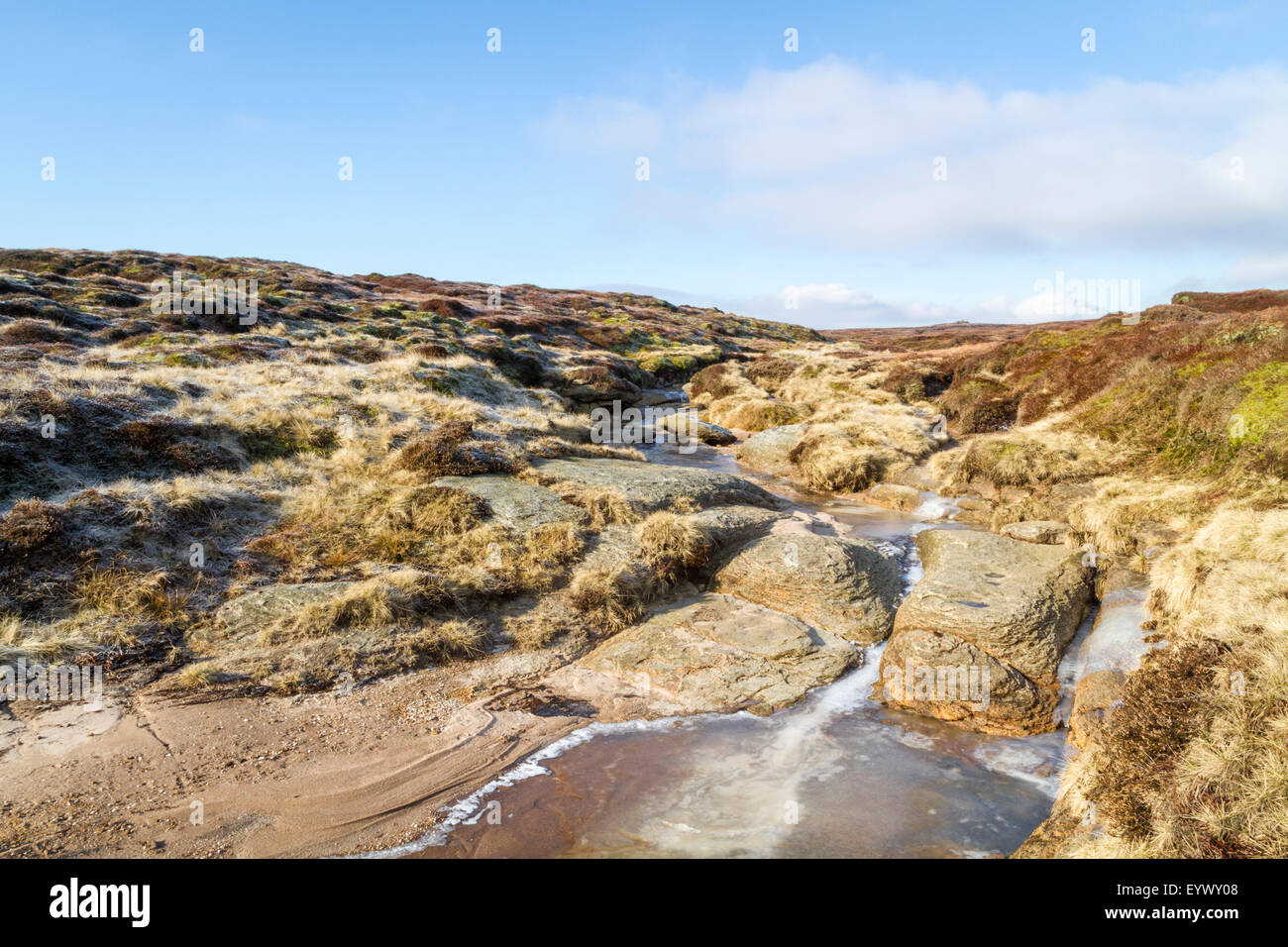 A frozen stream and moorland on Edale Moor in winter sunshine, Kinder ...